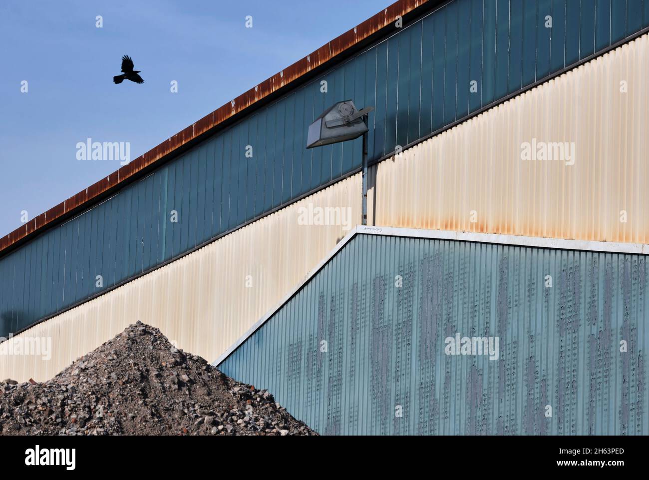 crow over workshop in the industrial area Stock Photo - Alamy