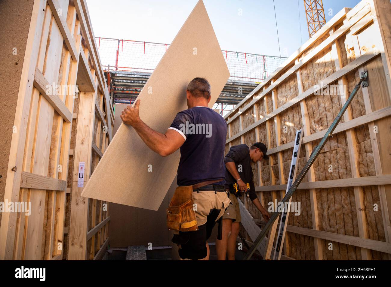 germany,bavaria,construction of a prefabricated wooden house ...