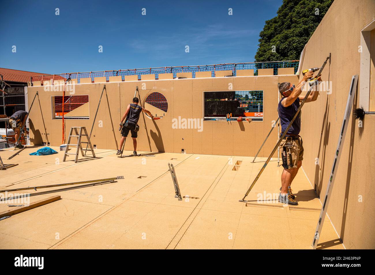 germany,bavaria,construction of a prefabricated wooden house,building ...
