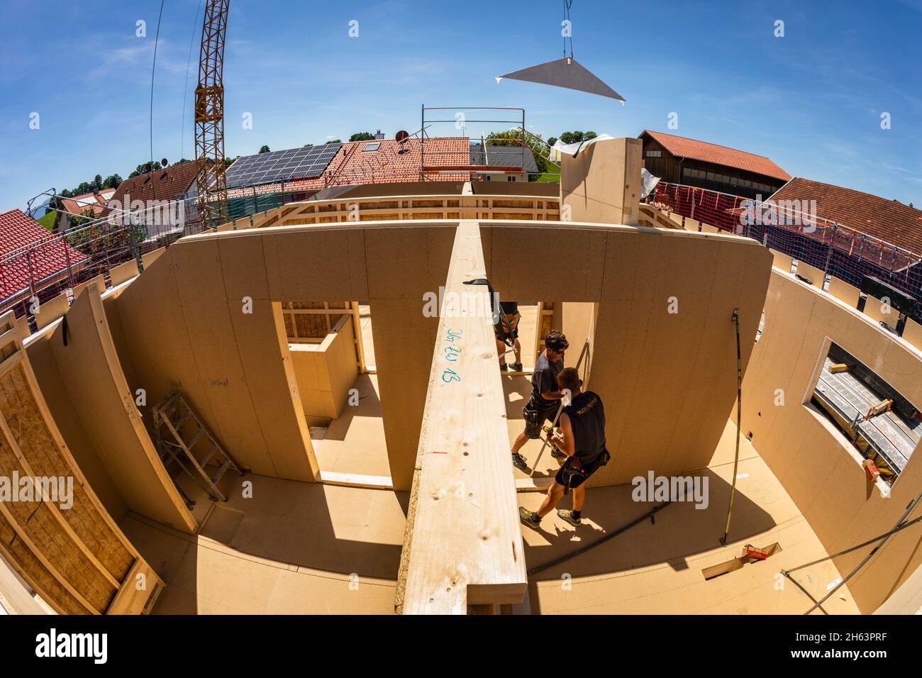 germany,bavaria,construction of a prefabricated wooden house ...