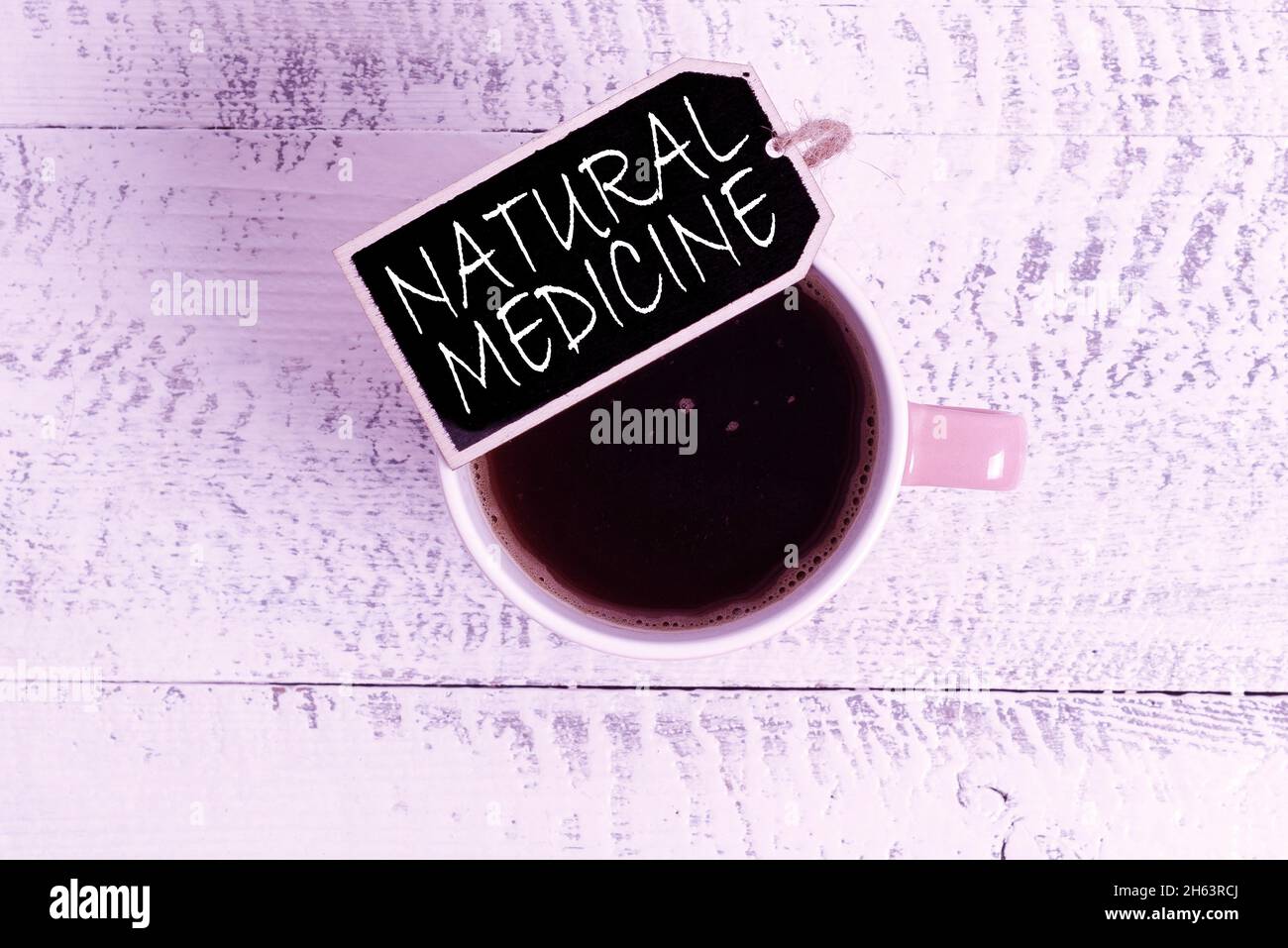 Hand writing sign Natural Medicine. Word for any of various systems of ...