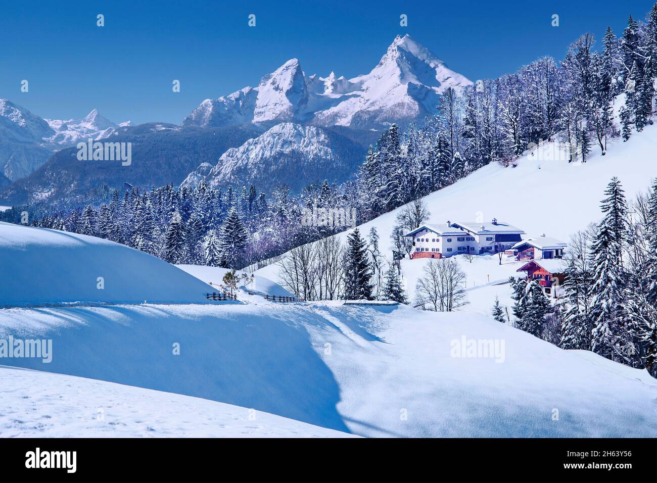 winter landscape in the high valley of maria gern with mountain farm ...