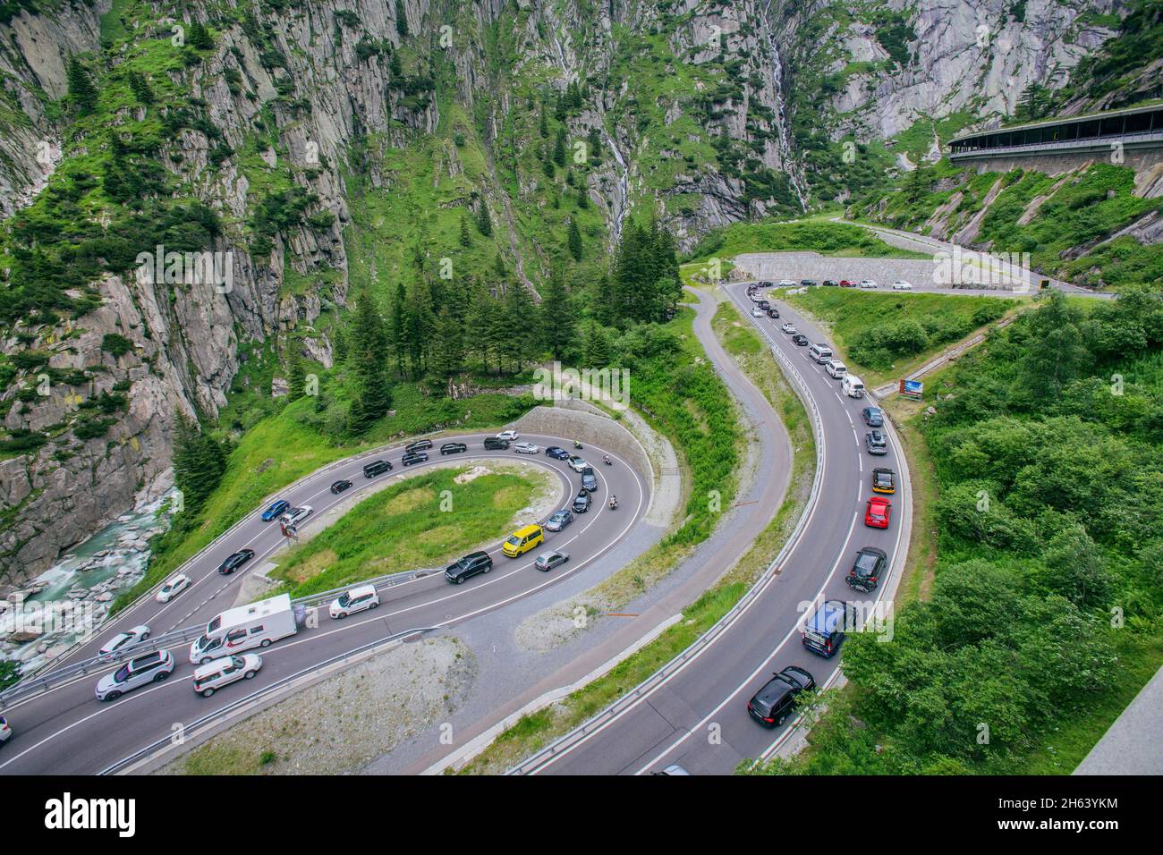 serpentines of the gotthard pass road with heavy car traffic in the ...