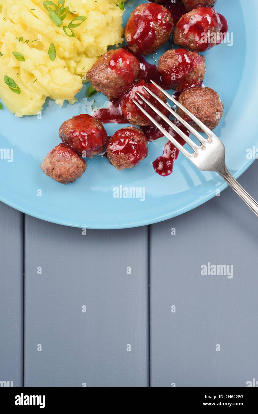 Traditional Sweden dish. Beef meatballs with sour berry sauce and ...