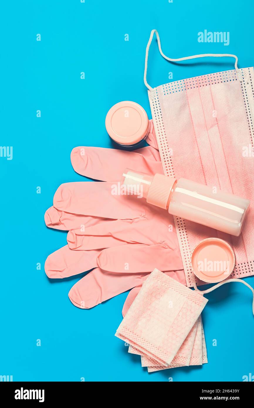 Antivirus protective kit for a woman's bag in pink. Mask, medical ...