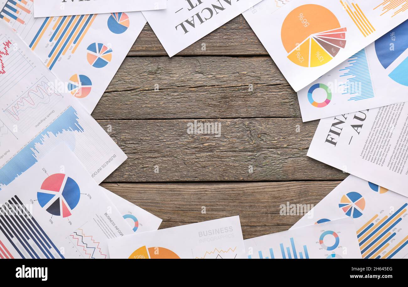 Frame made of business documents on wooden background Stock Photo - Alamy