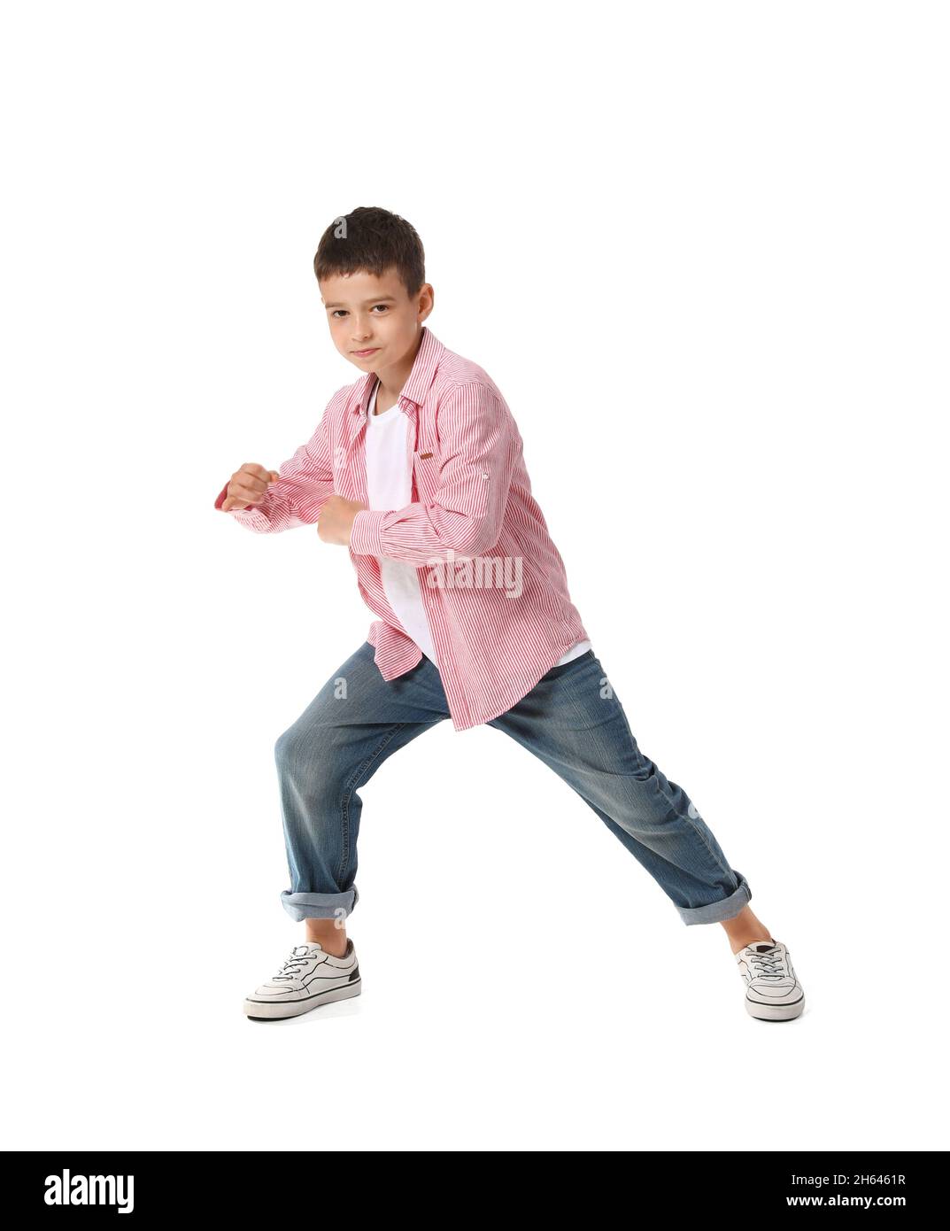 Dancing little boy on white background Stock Photo - Alamy