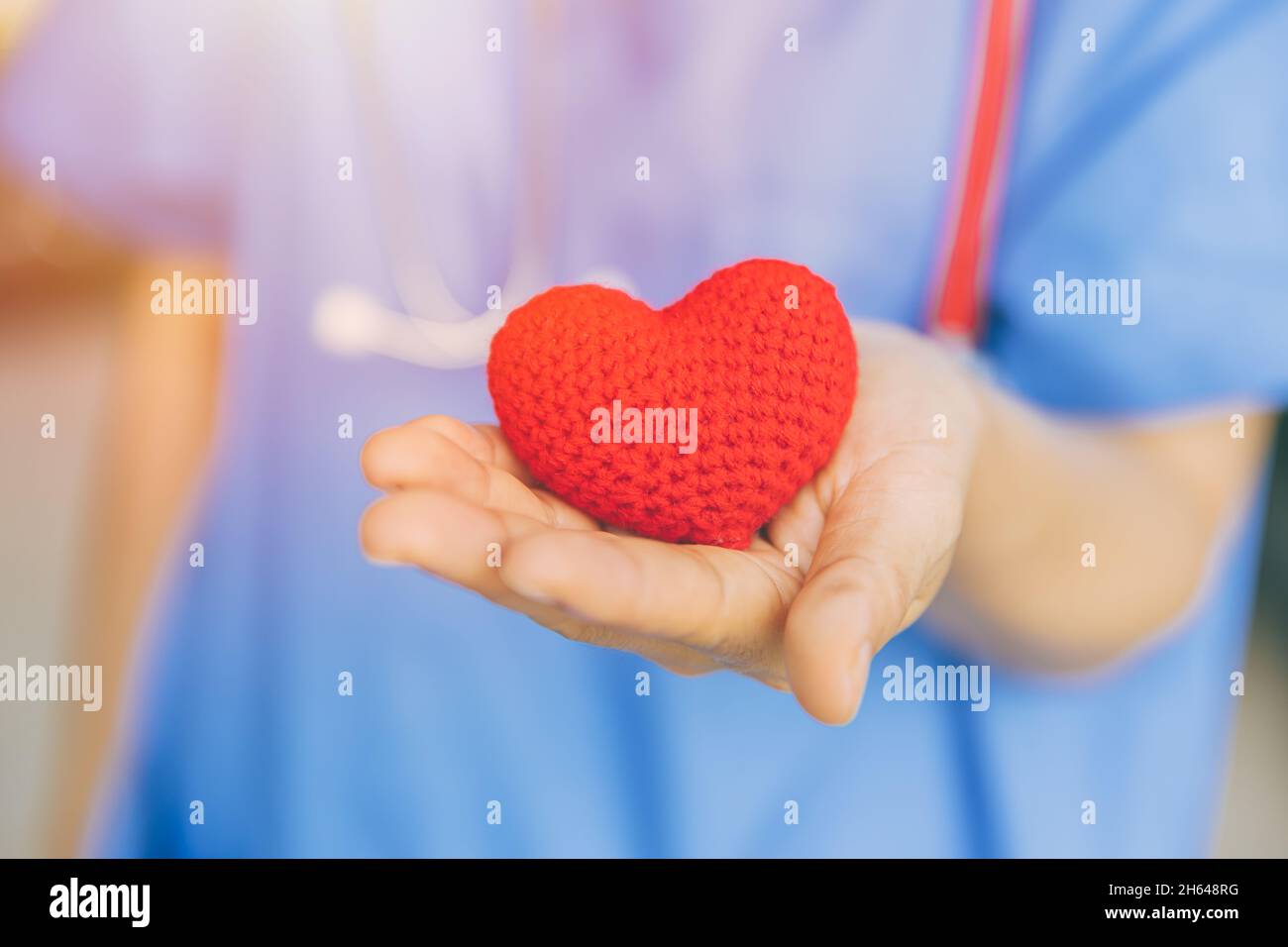 Hand giving red heart for help blood donation healthcare together share ...