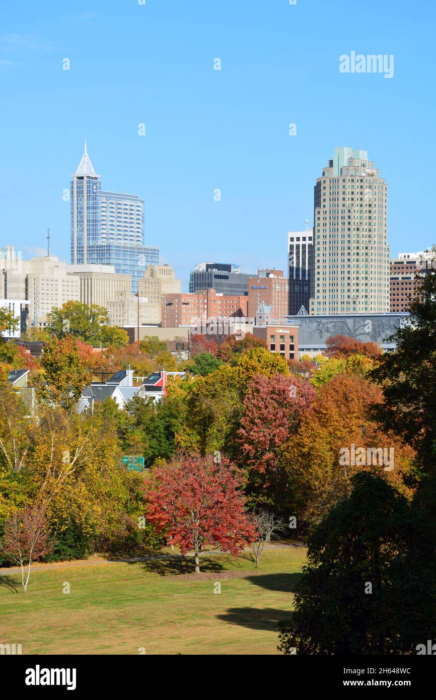 The downtown Raleigh skyline rises above autumn trees from the Dorothea ...