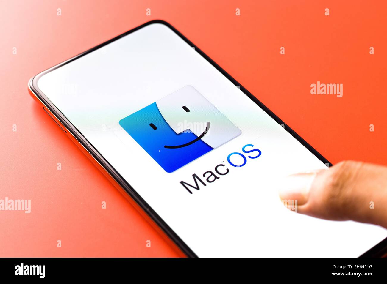 West Bangal, India - November 11, 2021 : MacOS logo on phone screen ...