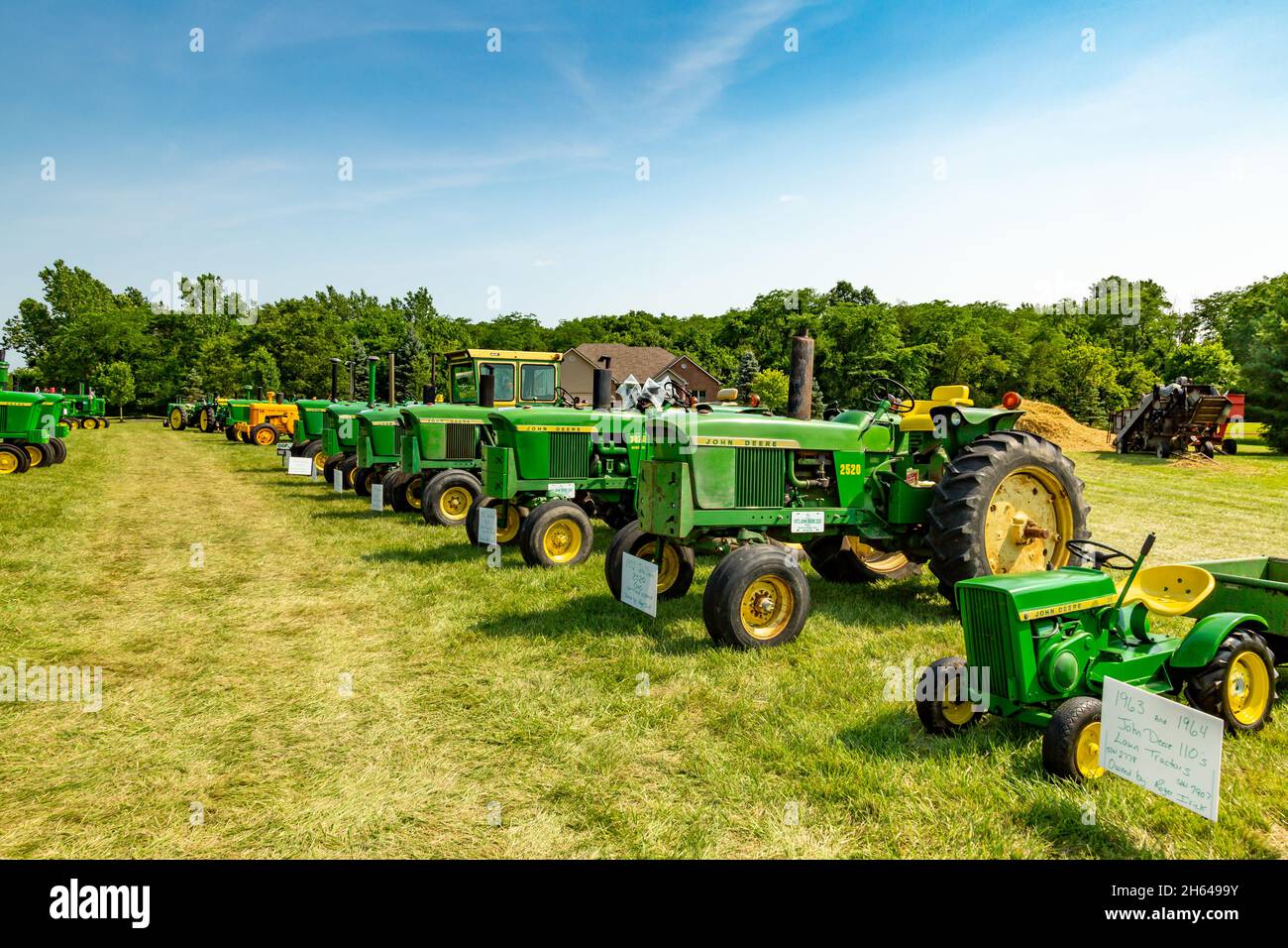 A model 110 garden tractor and a 1972 model 2520 row crop farm tractor ...