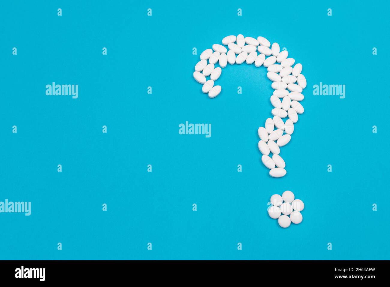 Question Mark Made from White Pills and Tablets, Lying on Blue ...
