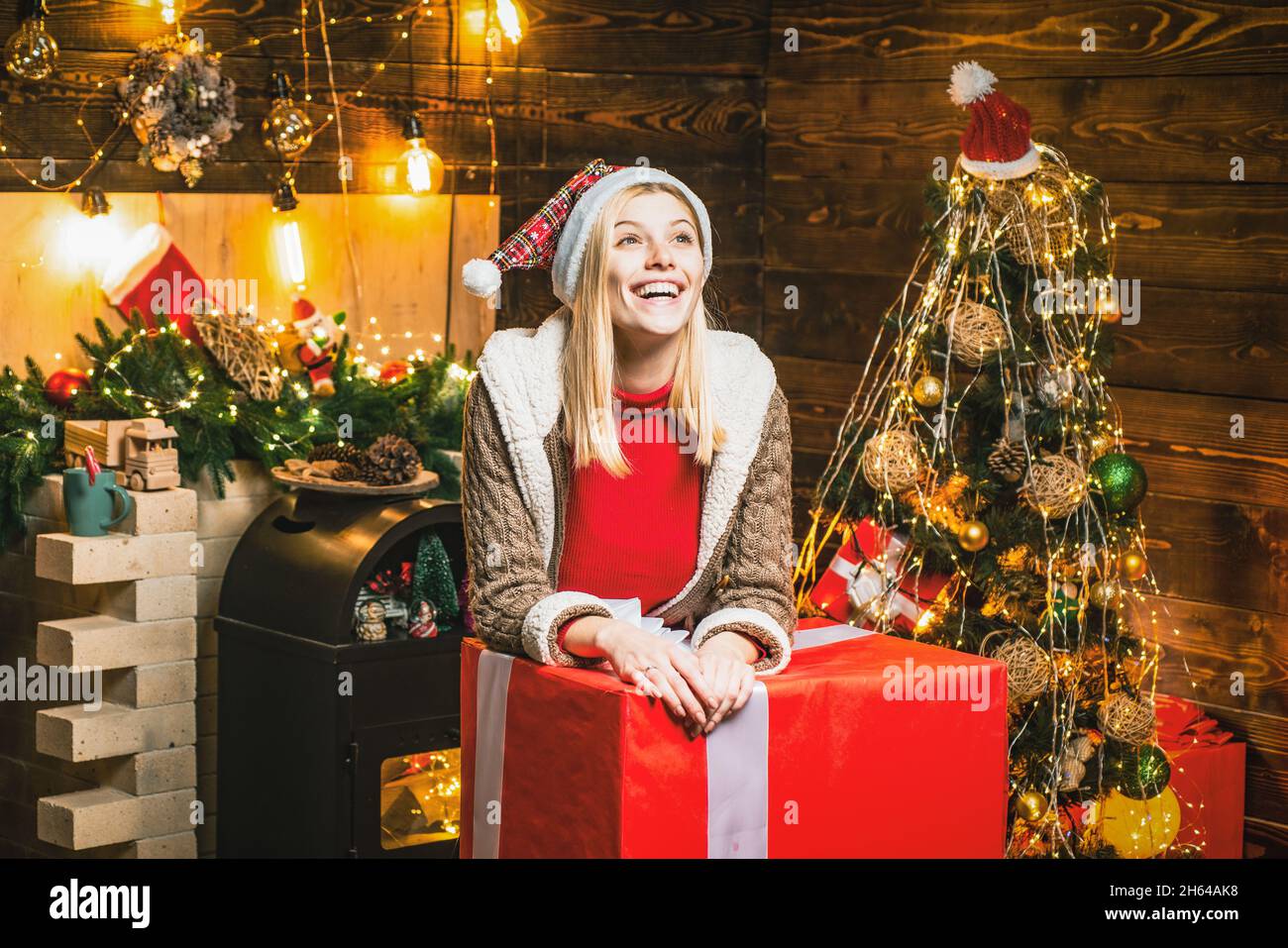Girl enjoy cozy warm christmas atmosphere at home. Christmas joy Stock ...