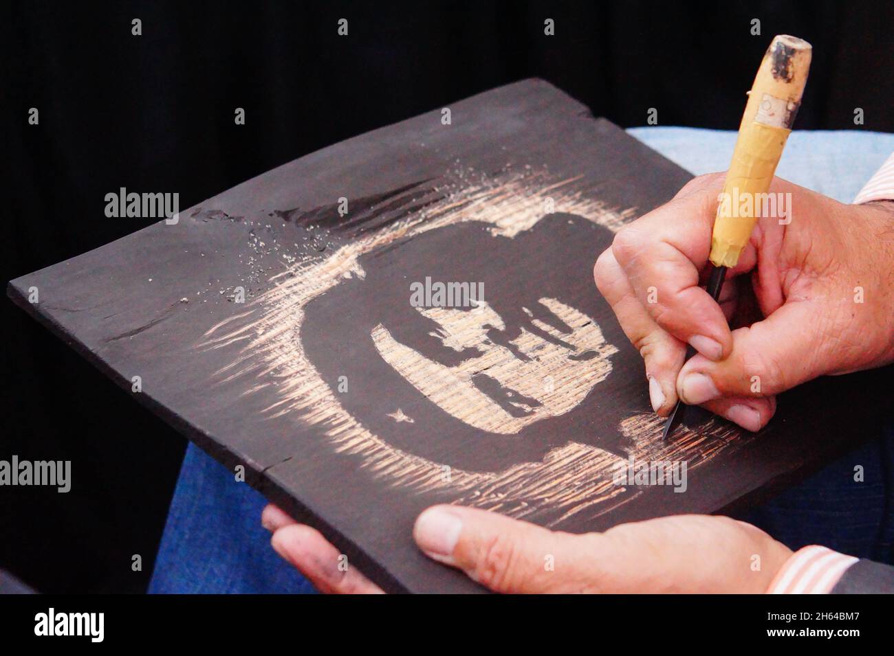 crafting designs on black board with crafting knife Stock Photo - Alamy