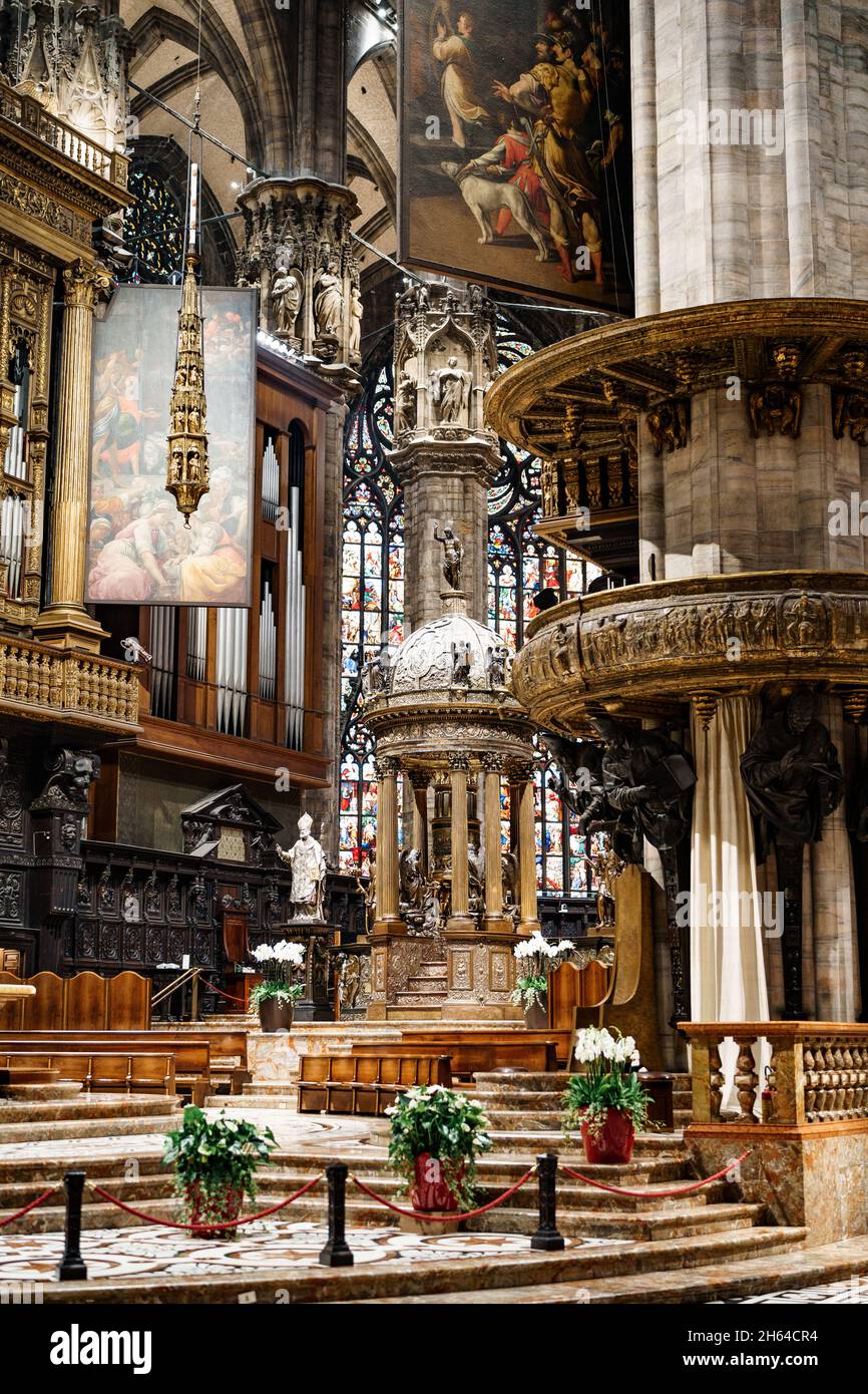 Beautiful altar with frescoes, icons and statues in the Duomo. Italy ...