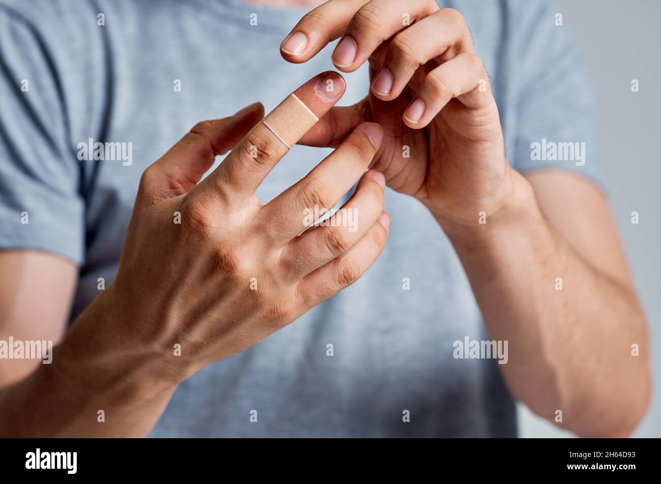 man with bandaged finger help treatment Stock Photo - Alamy