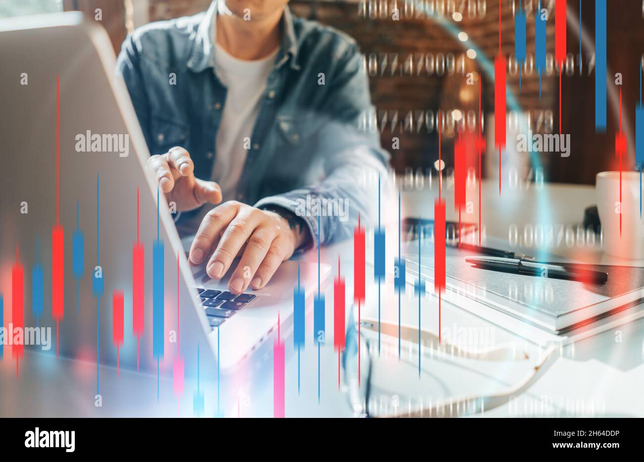Businessman working remotely from home. Technical price graph and ...