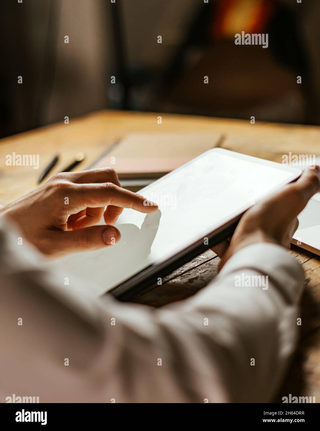 Close up photo of male hands tapping on digital tablet screen Stock ...
