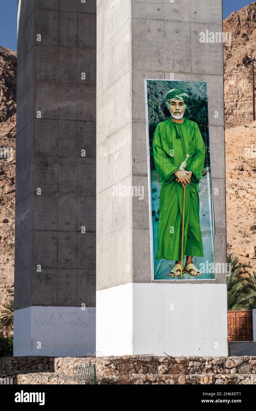 TIWI, OMAN - MARCH 4, 2017: Portrait of Sultan Qaboos on a pillar of a ...