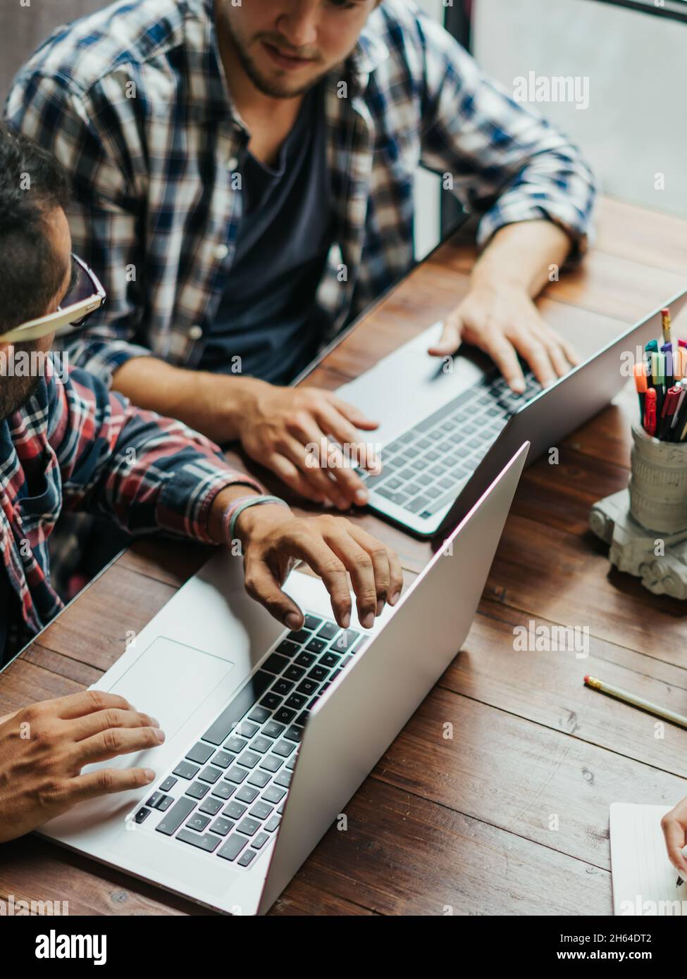 Group of young people working together. Creative business people in ...