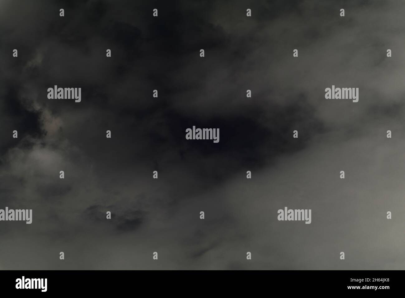 Scenic dark cumulus clouds before a storm Stock Photo - Alamy