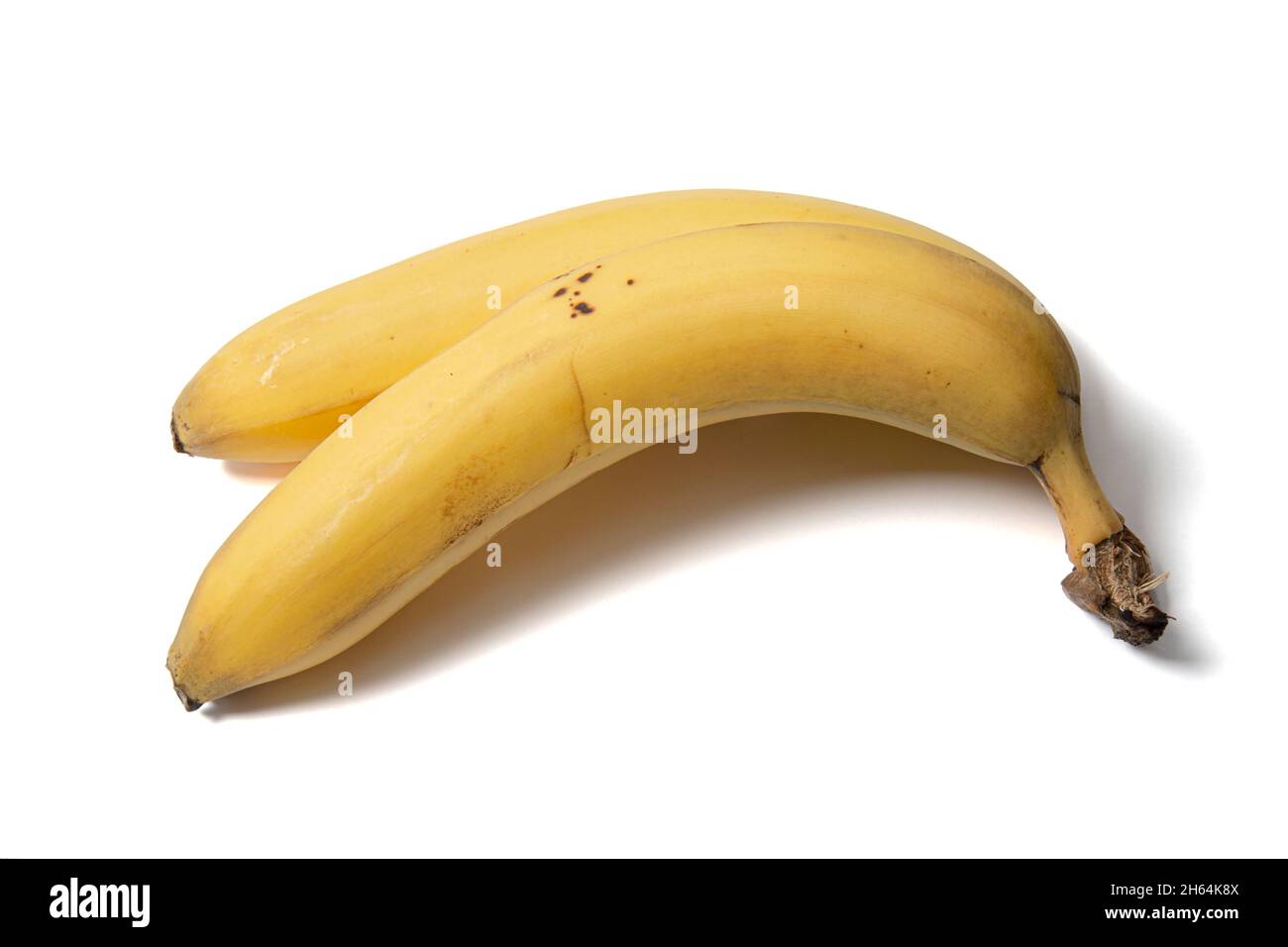 Two bananas isolated on white background Stock Photo - Alamy