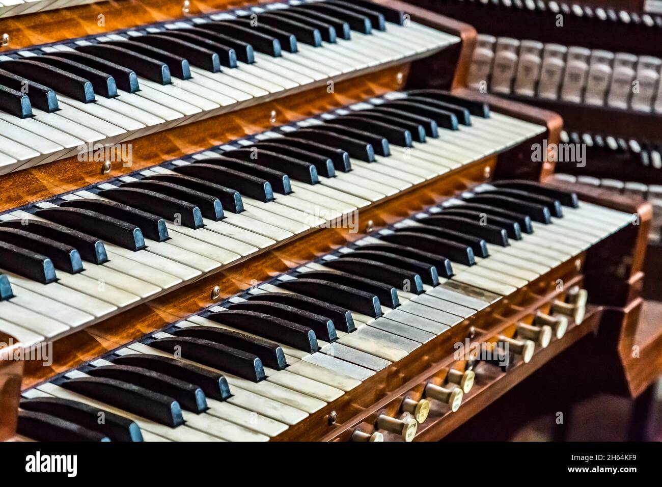 Close up of ancient pipe organ keyboards in european cathedral Stock ...