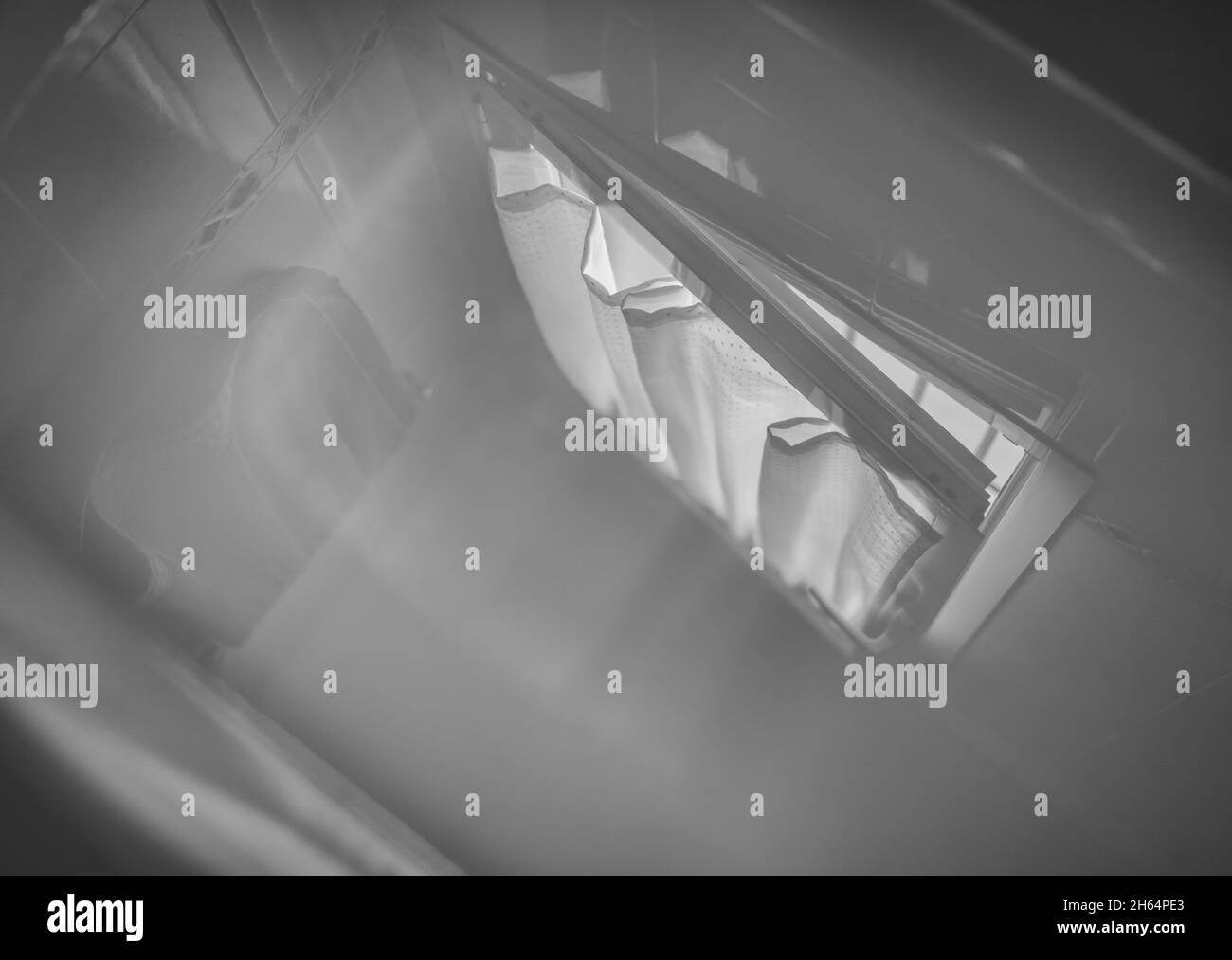 Grayscale top view of a window and curtains Stock Photo - Alamy
