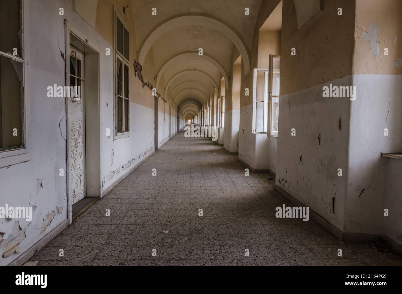 long corridor in old abandoned barracks Stock Photo - Alamy