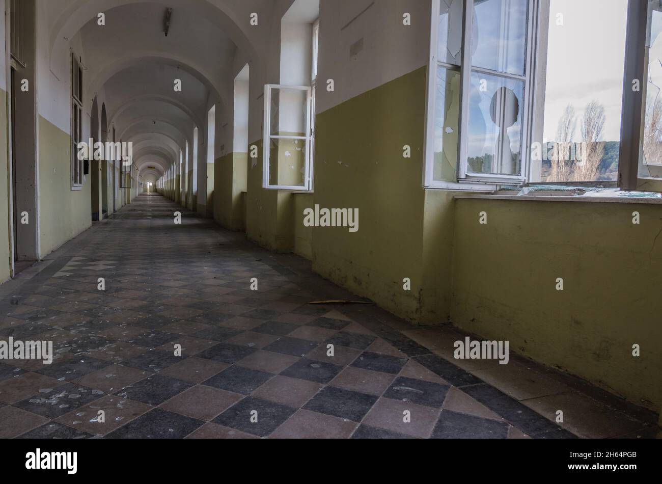 long old corridor in abandoned barracks Stock Photo - Alamy