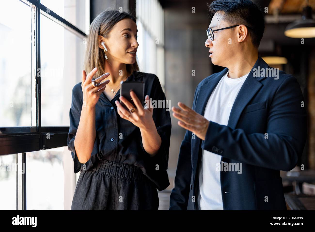 Business people talking during work in cafe Stock Photo - Alamy