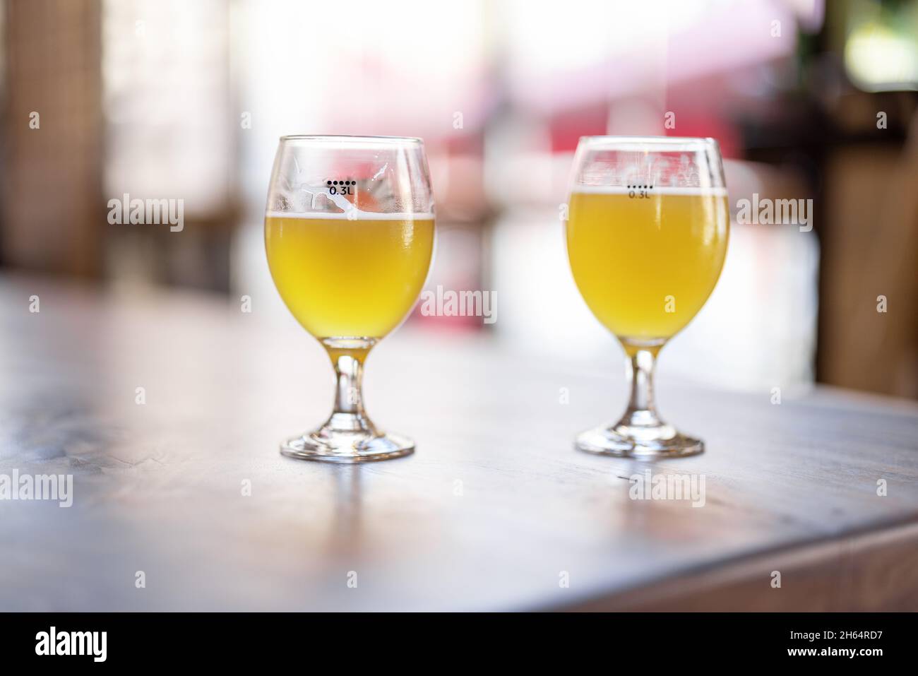 Wooden table with alcohol cocktails at cafe Stock Photo - Alamy