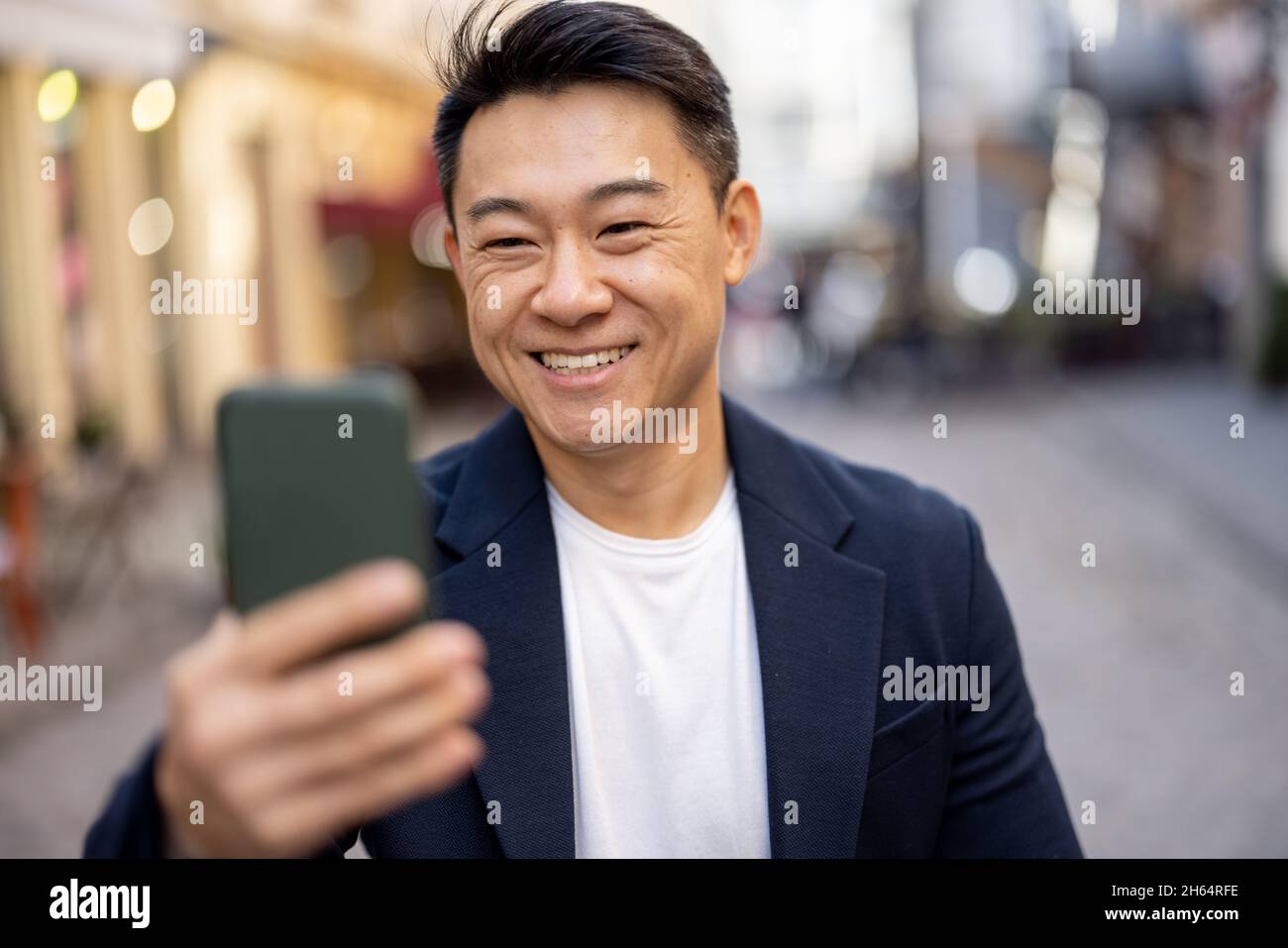 Asian man video call work hi-res stock photography and images - Alamy