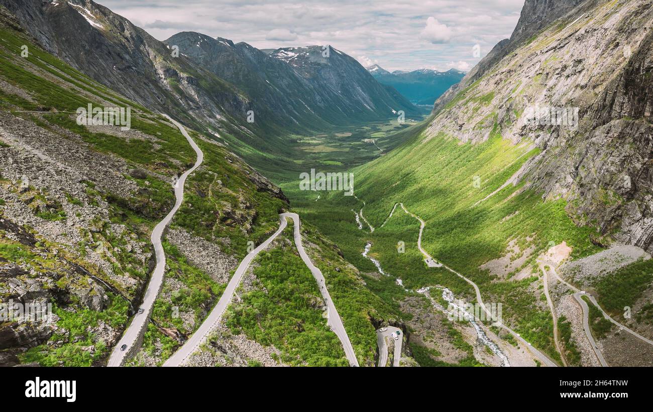 Trollstigen, Andalsnes, Norway. Cars Goes On Serpentine Mountain Road ...
