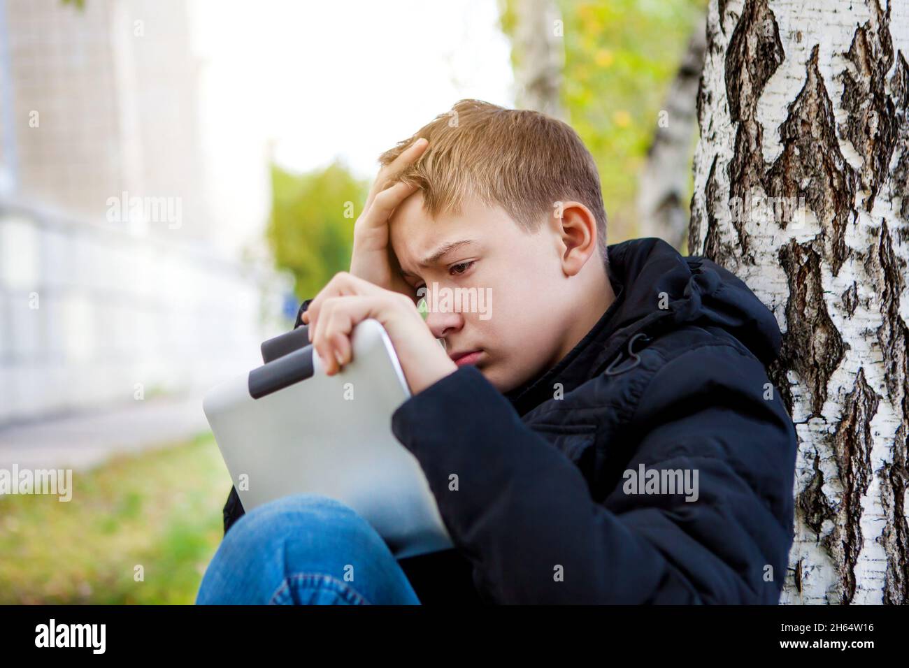 Teen boy computer sad hi-res stock photography and images - Alamy