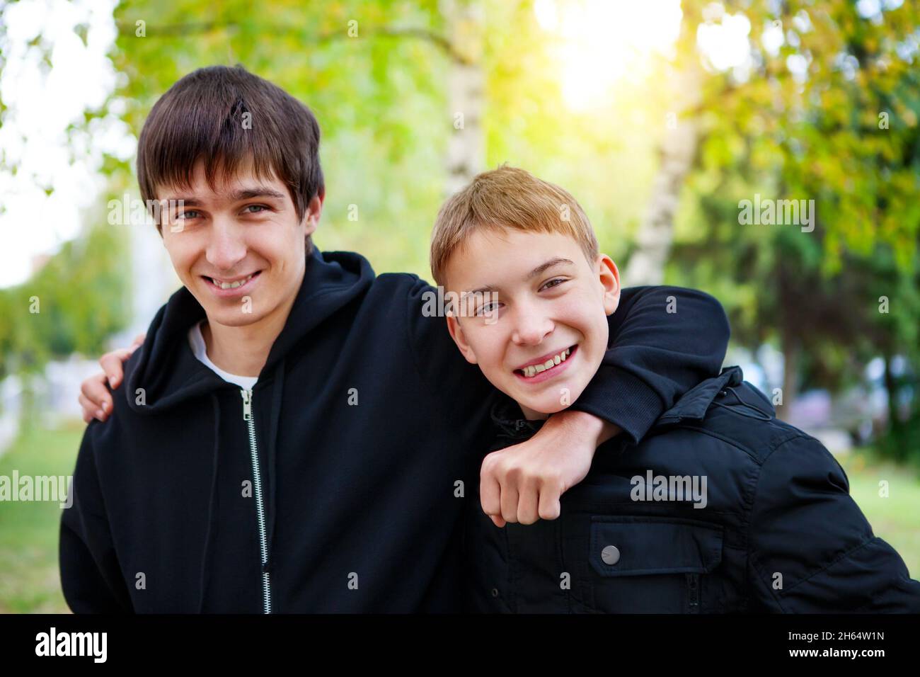 Happy teen brothers hi-res stock photography and images - Alamy