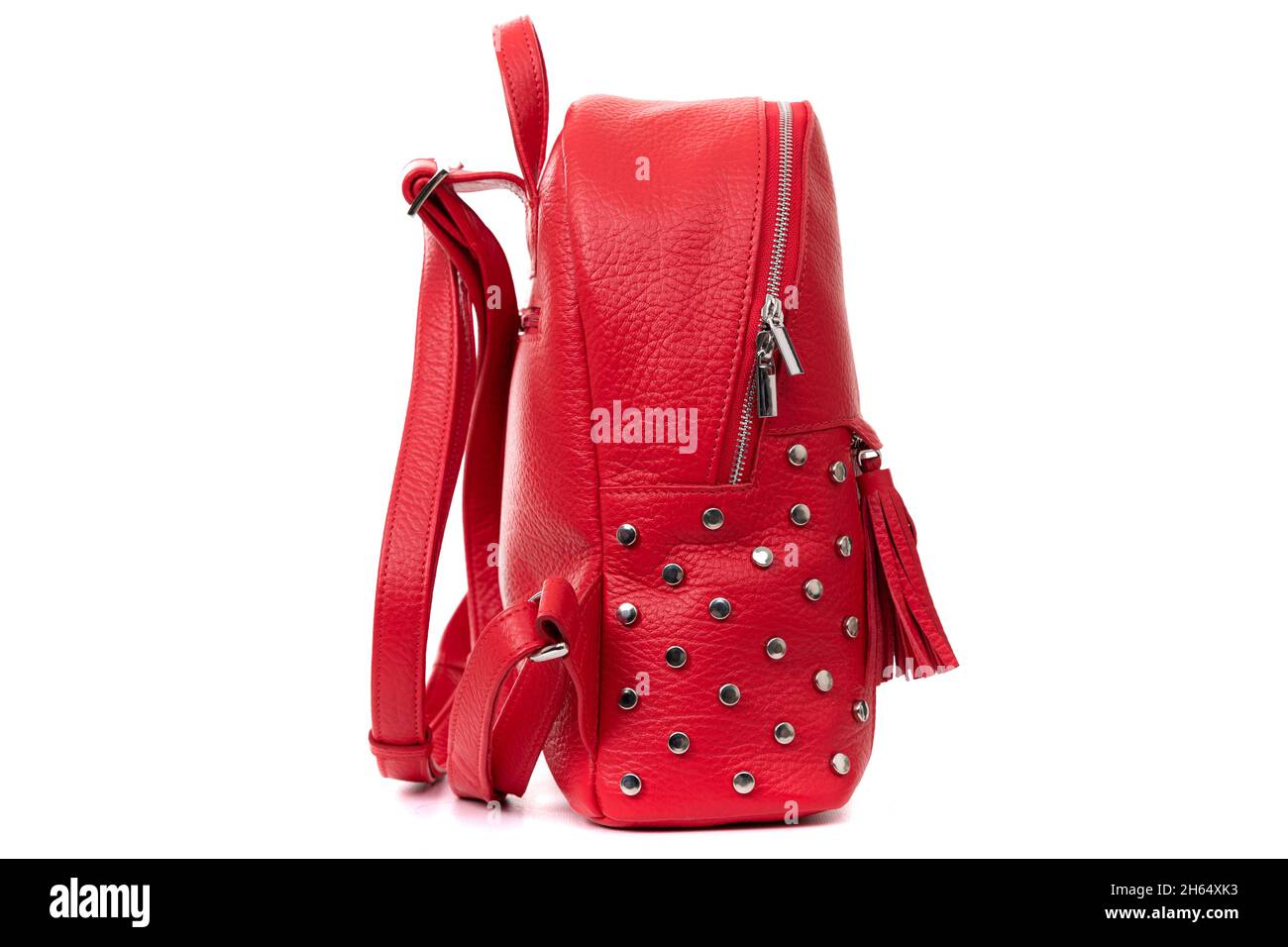 red backpack made of genuine leather on white isolated background, side ...