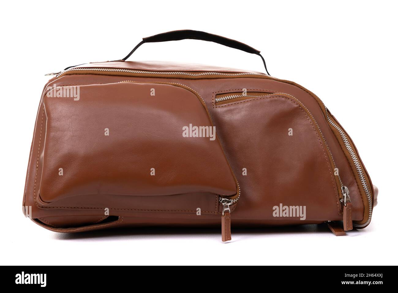 light brown backpack made of genuine leather on a white background ...