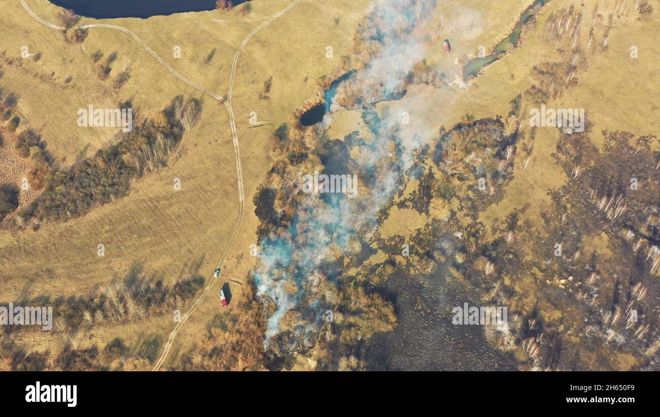 Aerial View. Spring Dry Grass Burns During Drought Hot Weather. Bush ...