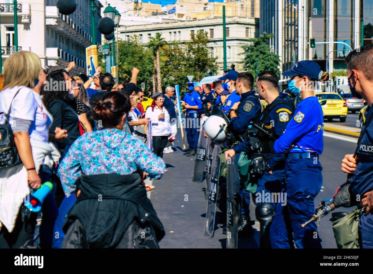 Athens, Greece - November 03, 2021 Police and protester face to face ...