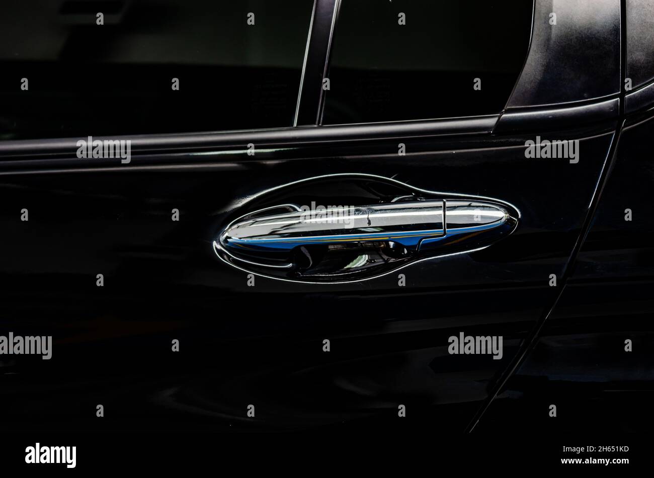 Modern black car door handle.Car door handle is an external part of the ...