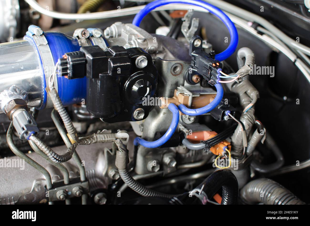 Close up shot of car engine details Stock Photo - Alamy