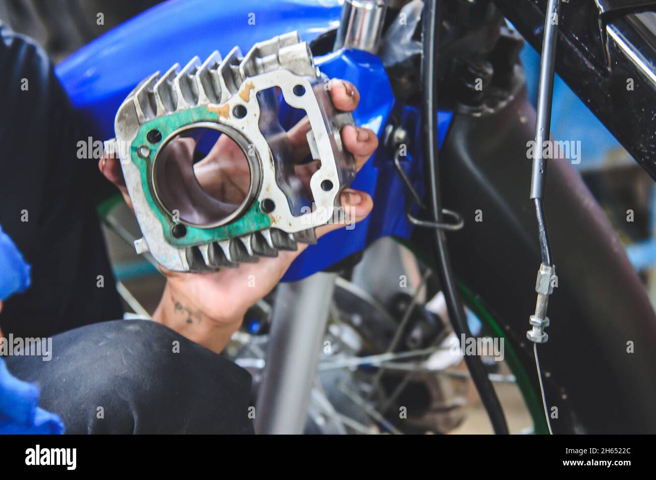 Mechanical repairs engine motorcycle Stock Photo - Alamy