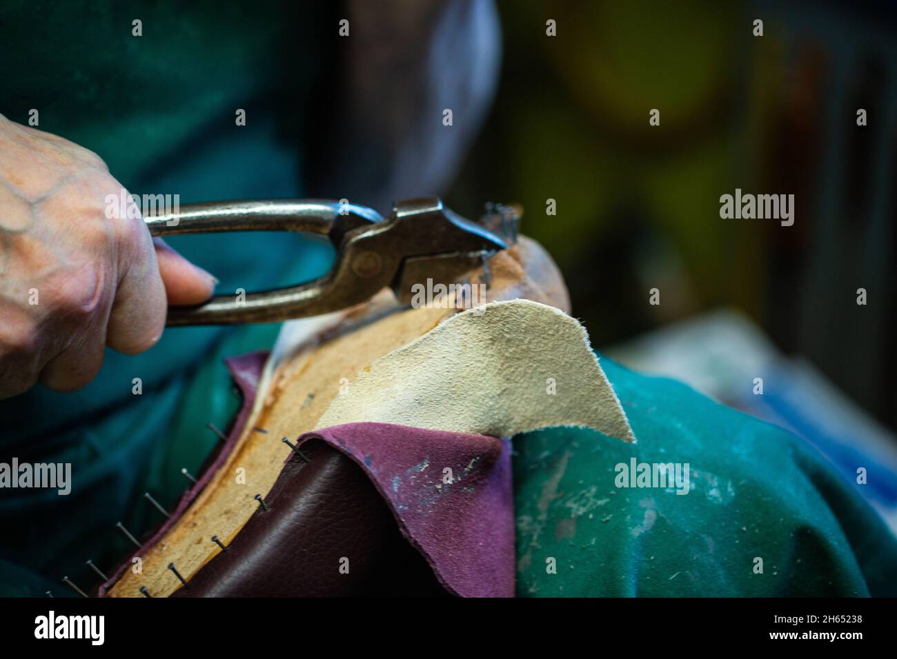 Master shoemaker producing shoes, master orthopedic, master orthopedic ...