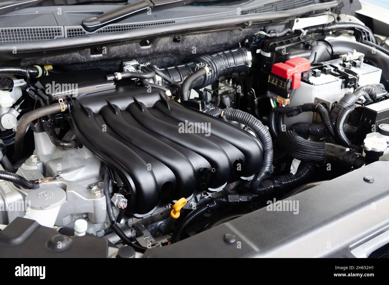 Wash the car engine clean at the car wash shop Stock Photo - Alamy