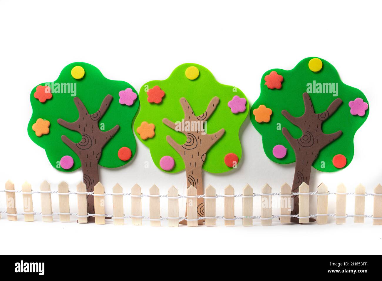 Handcrafted fabulous toy trees made from soft material. Tree and fence ...