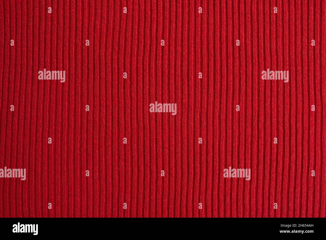 Red knitted fabric texture as background Stock Photo - Alamy
