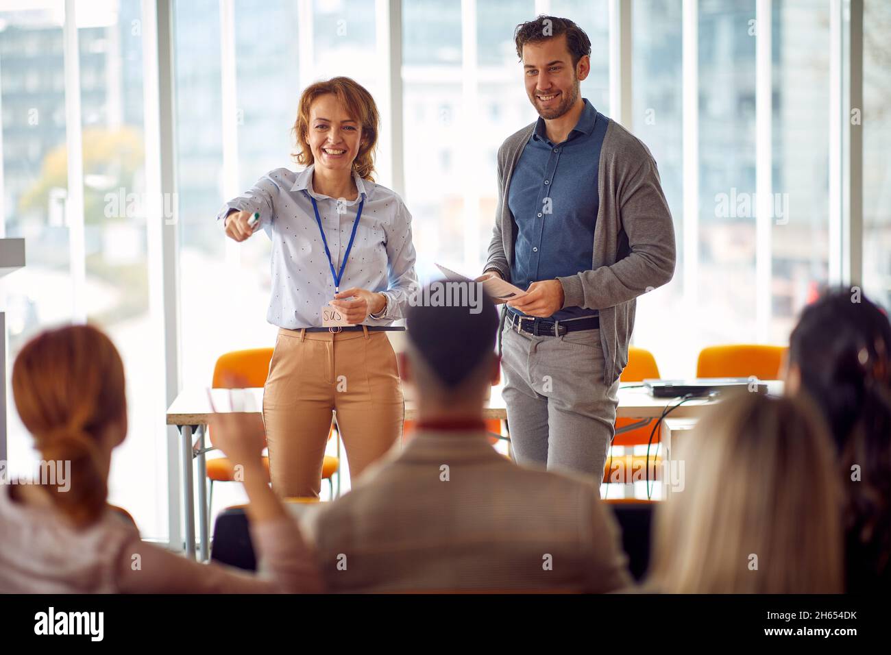 Men discussing presentation hi-res stock photography and images - Alamy