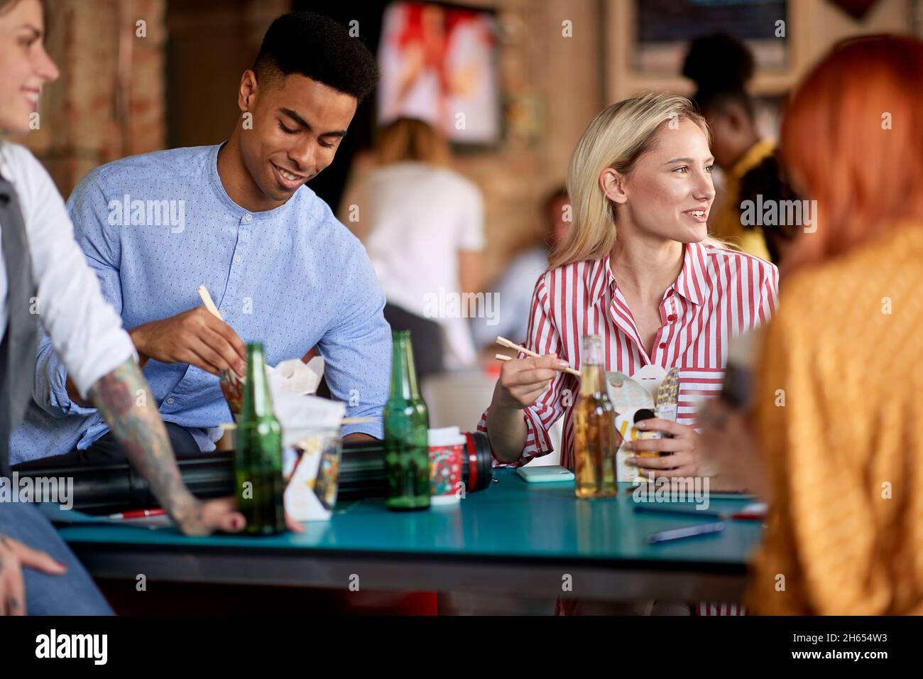 Lunch break in a relaxed atmosphere in the office Stock Photo - Alamy
