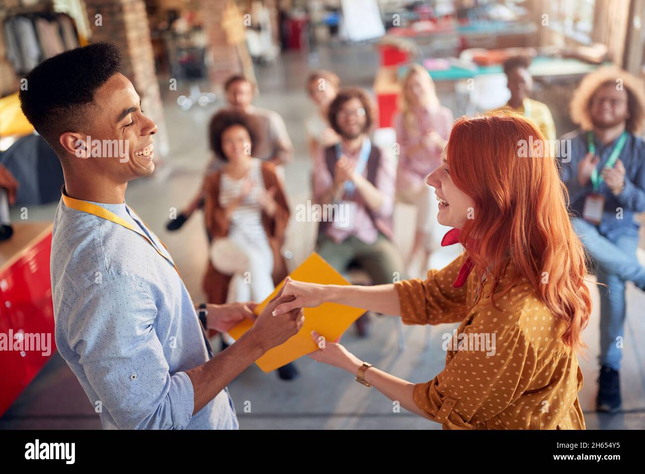 Receiving a certificate hi-res stock photography and images - Alamy